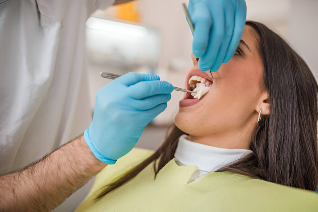 How much is a tooth extraction NHS?